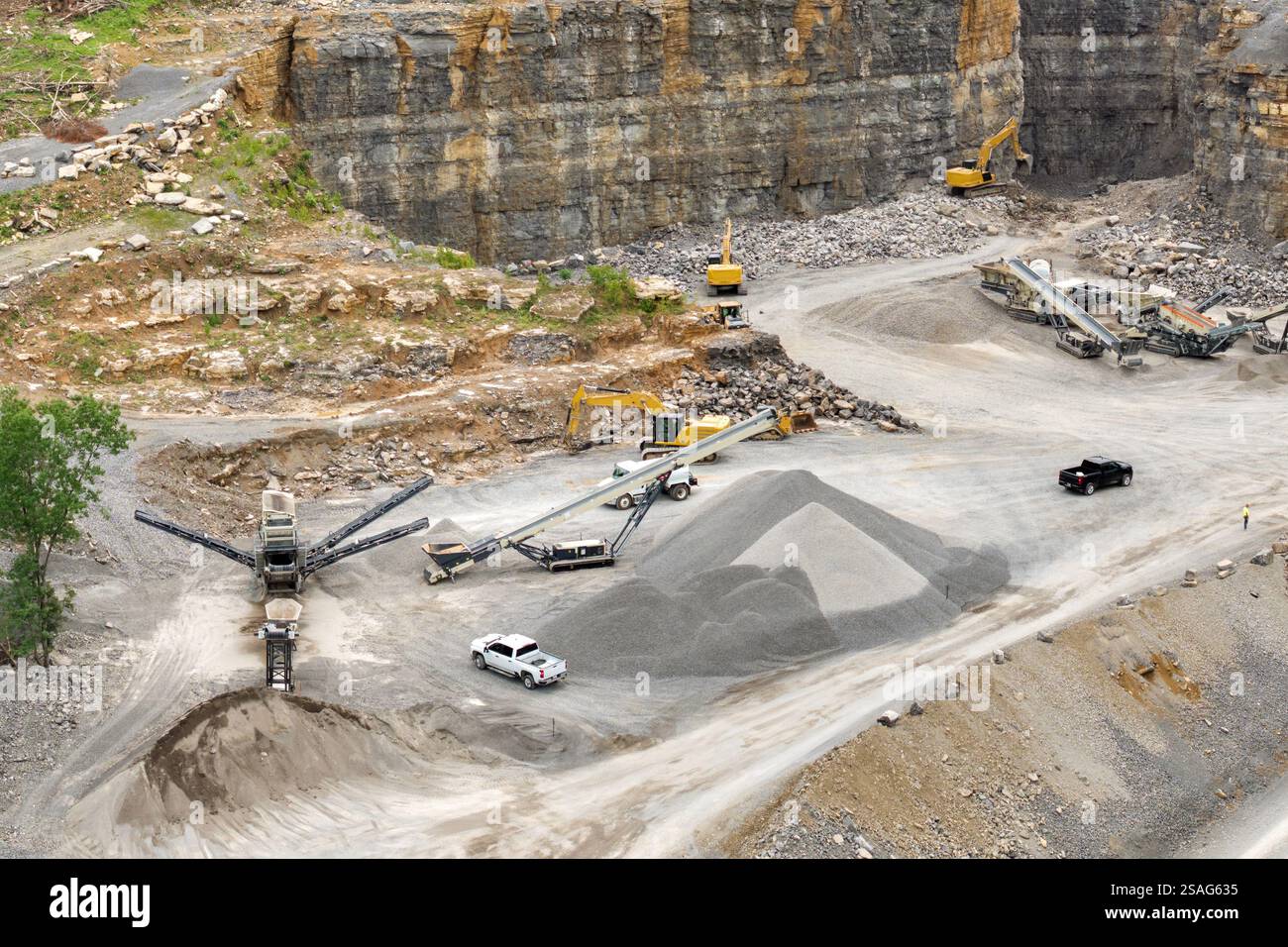Aerial view of open pit mining site of limestone materials extraction ...