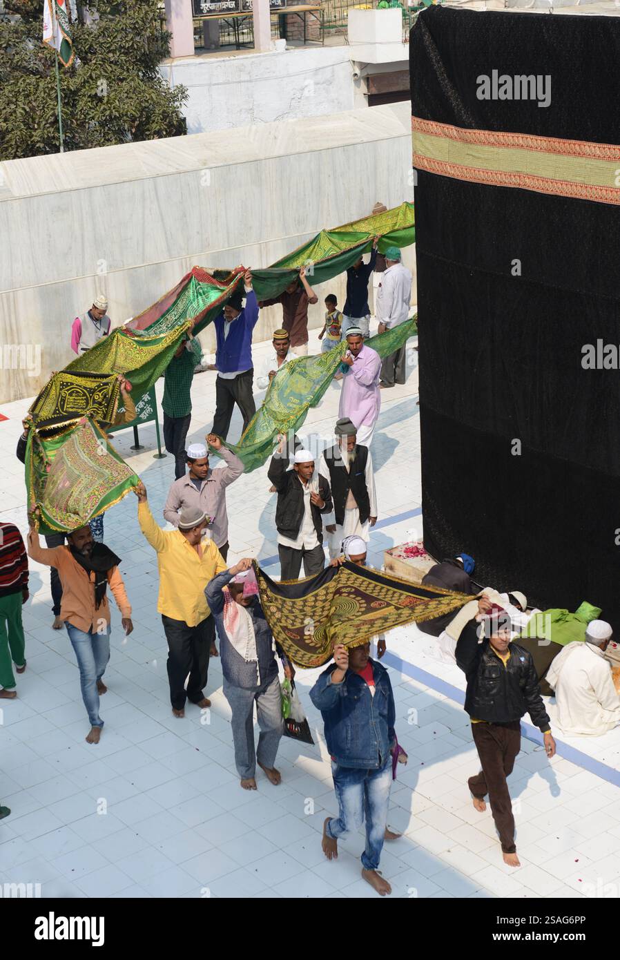 A ceremony and prayers around the tomb of Sufi saint Zinda Shah in ...