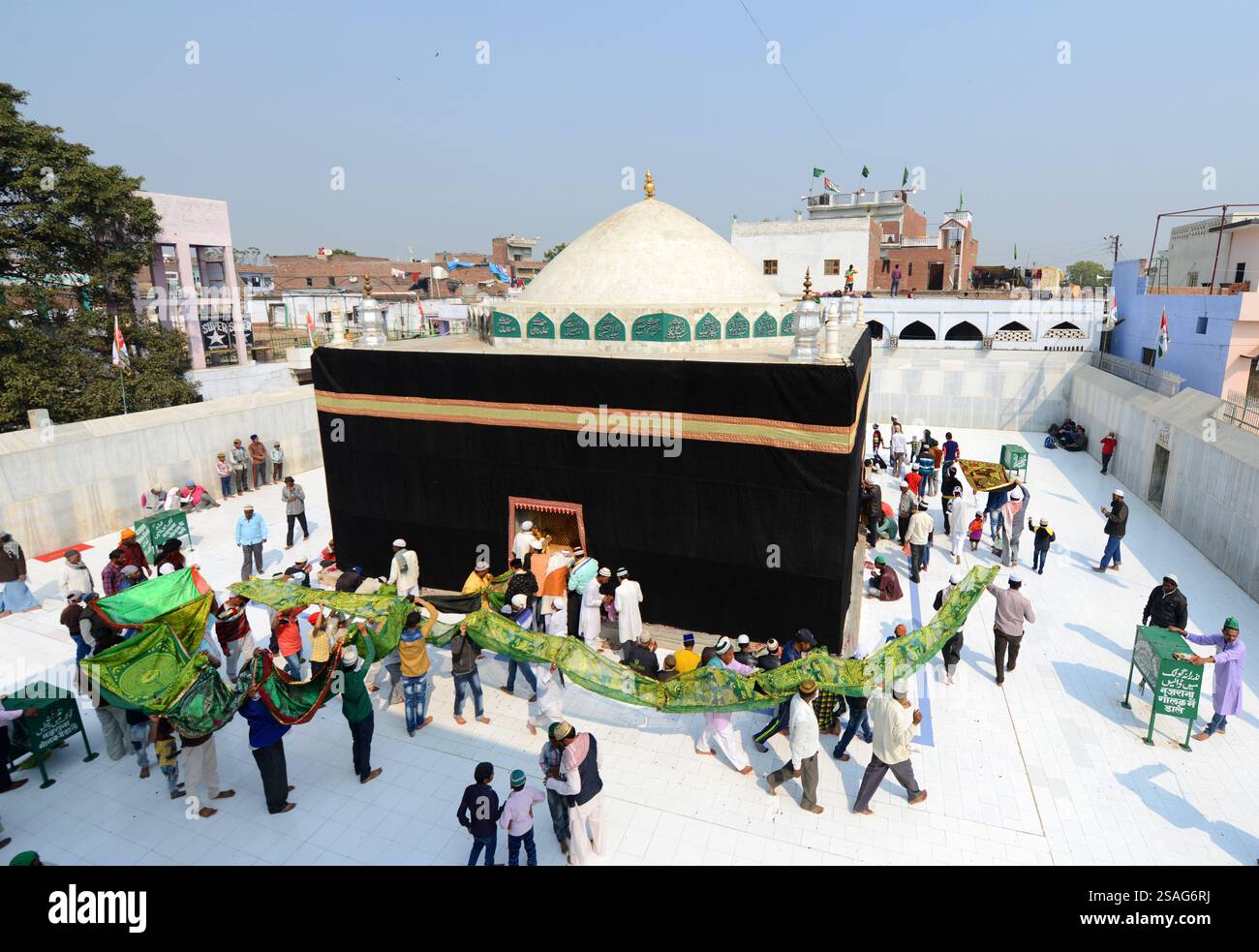A ceremony and prayers around the tomb of Sufi saint Zinda Shah in ...