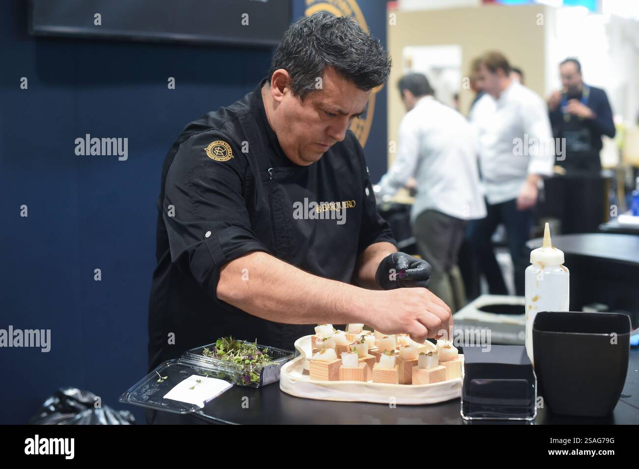 Madrid, Spain. 29th Jan, 2025. A chef prepares some "tapas" during the ...