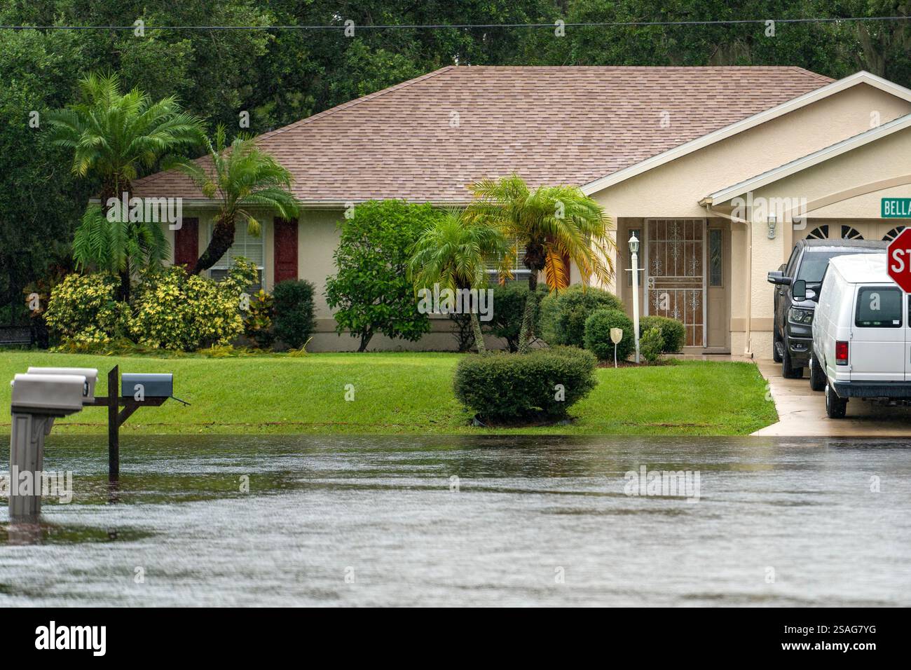 Hurricane flooded street with mail box surrounded with water in Florida ...