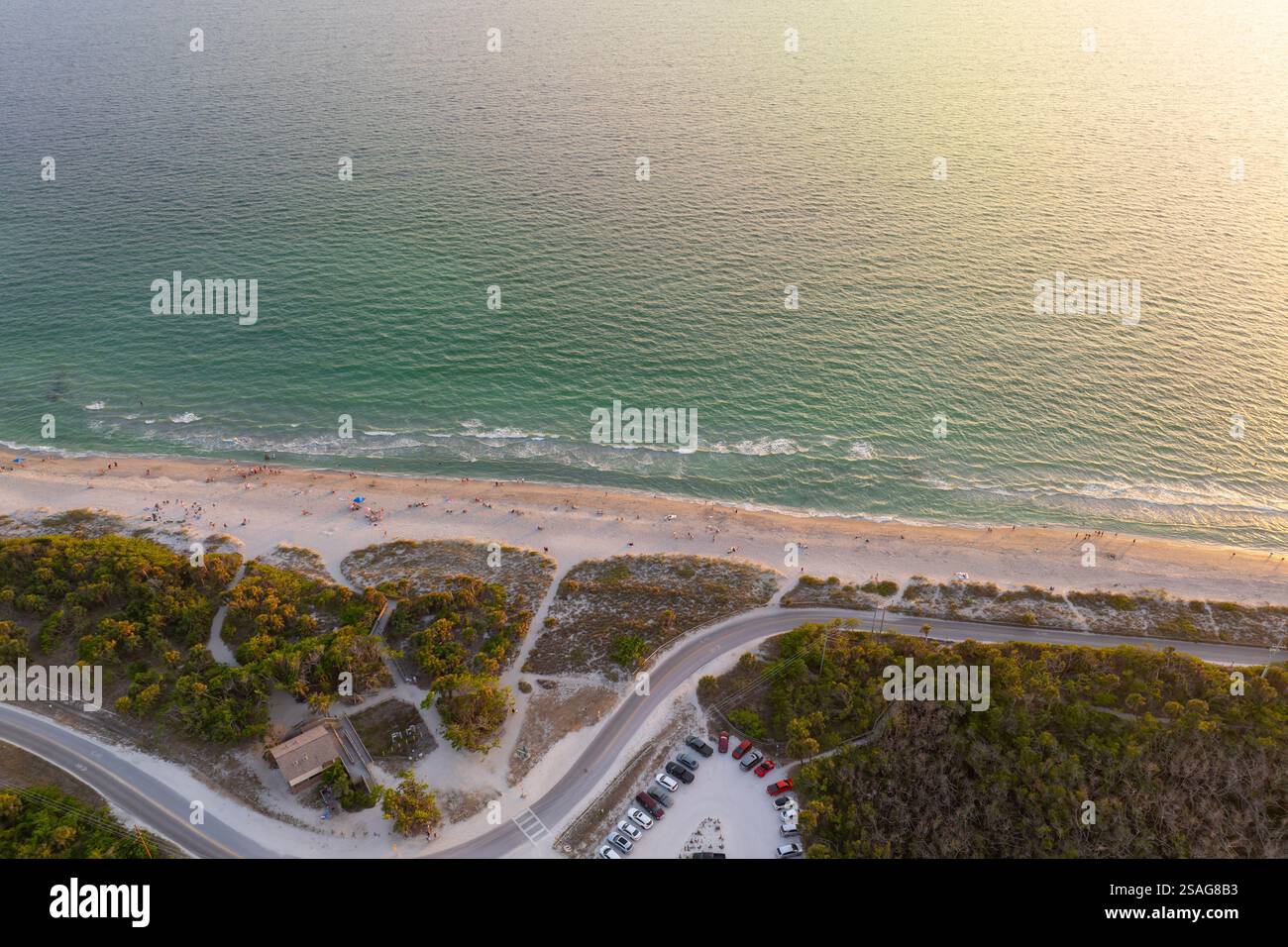 Parking lot at Florida Blind Pass beach on Manasota Key, USA. Vehicle ...