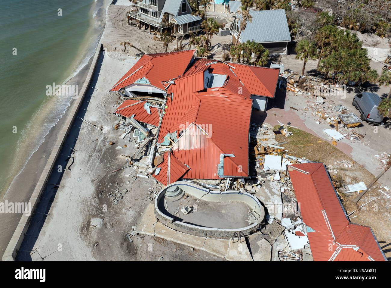 Storm surge severe damage to residential houses on ocean shore after ...
