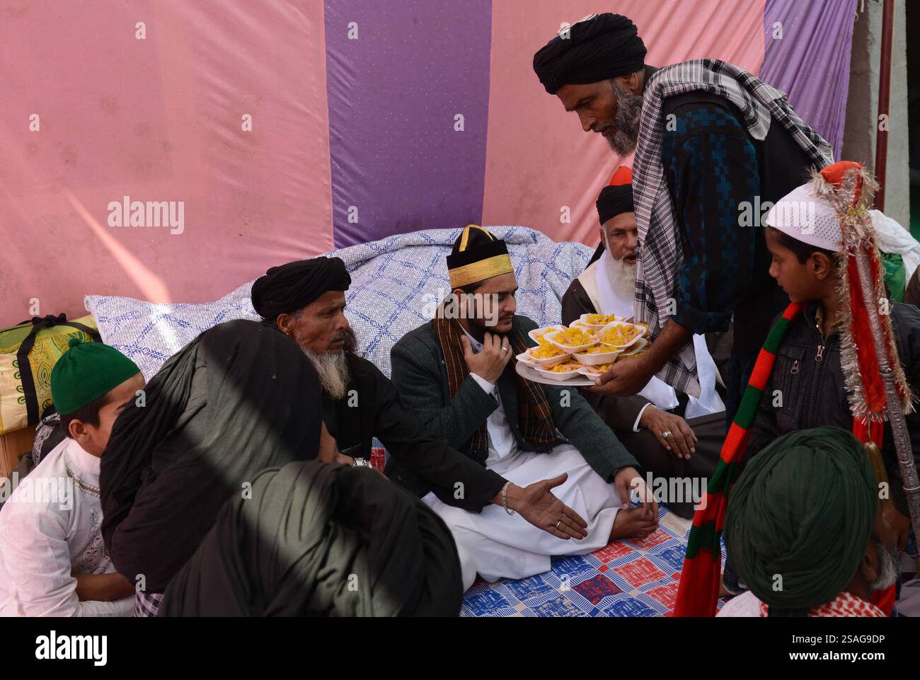 A Sufi spiritual gathering during the annual Makanpur mela in Uttar ...