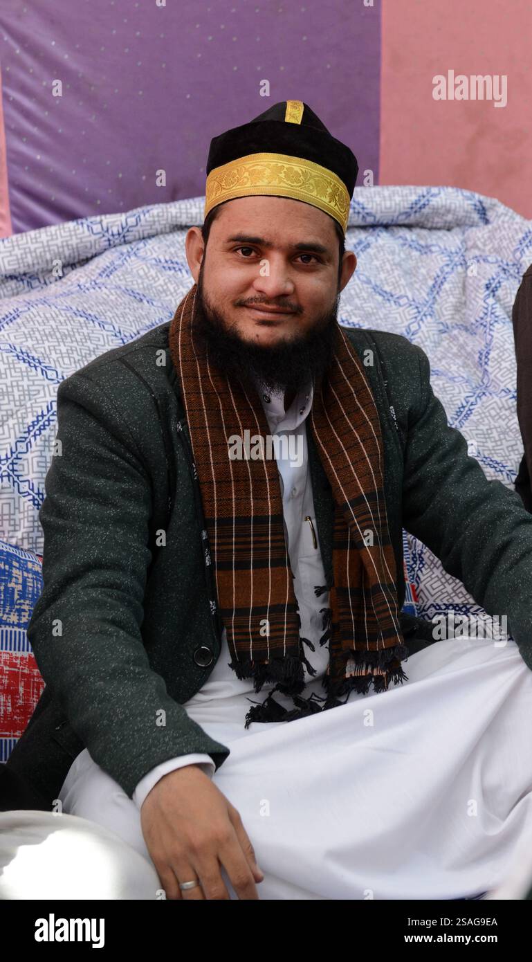 Portrait of a Sufi man taken at the Makanpur Mela in Uttar Pradesh ...