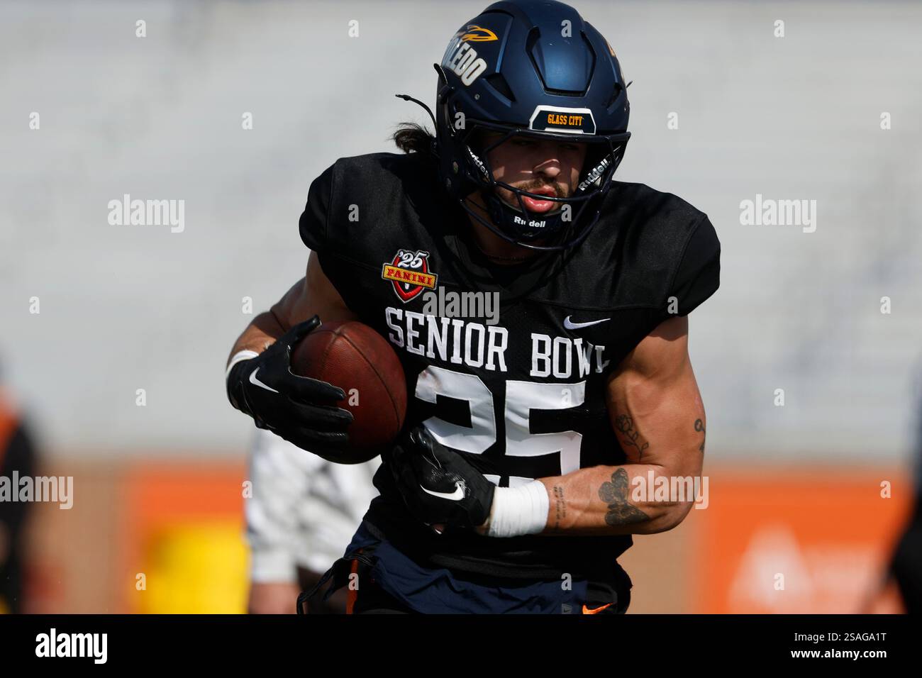 National team defensive back Maxen Hook of Toledo (25) runs through ...