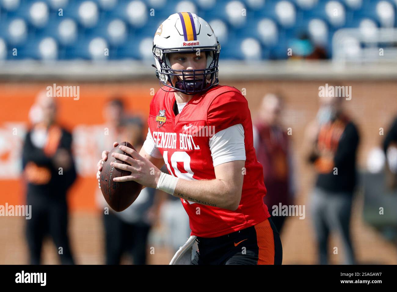 National team quarterback Taylor Elgersma of Laurier (18) runs through ...