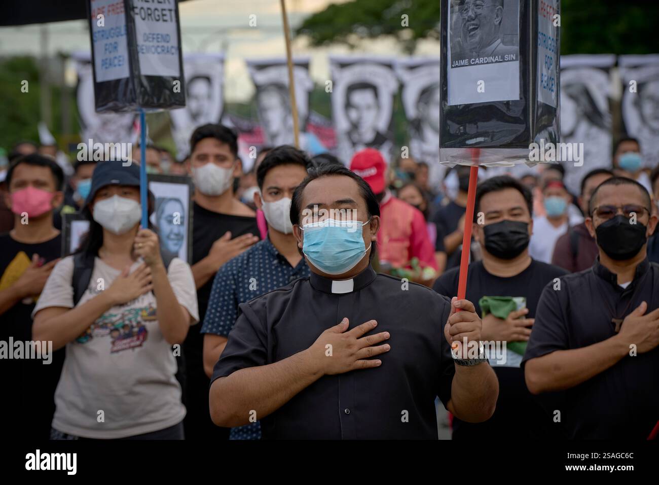 Church activists sing the national anthem on September 21, 2022, as ...