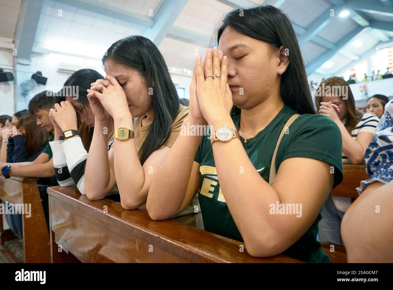 Women pray during Mass at the Taichung Catholic Church in Taichung ...
