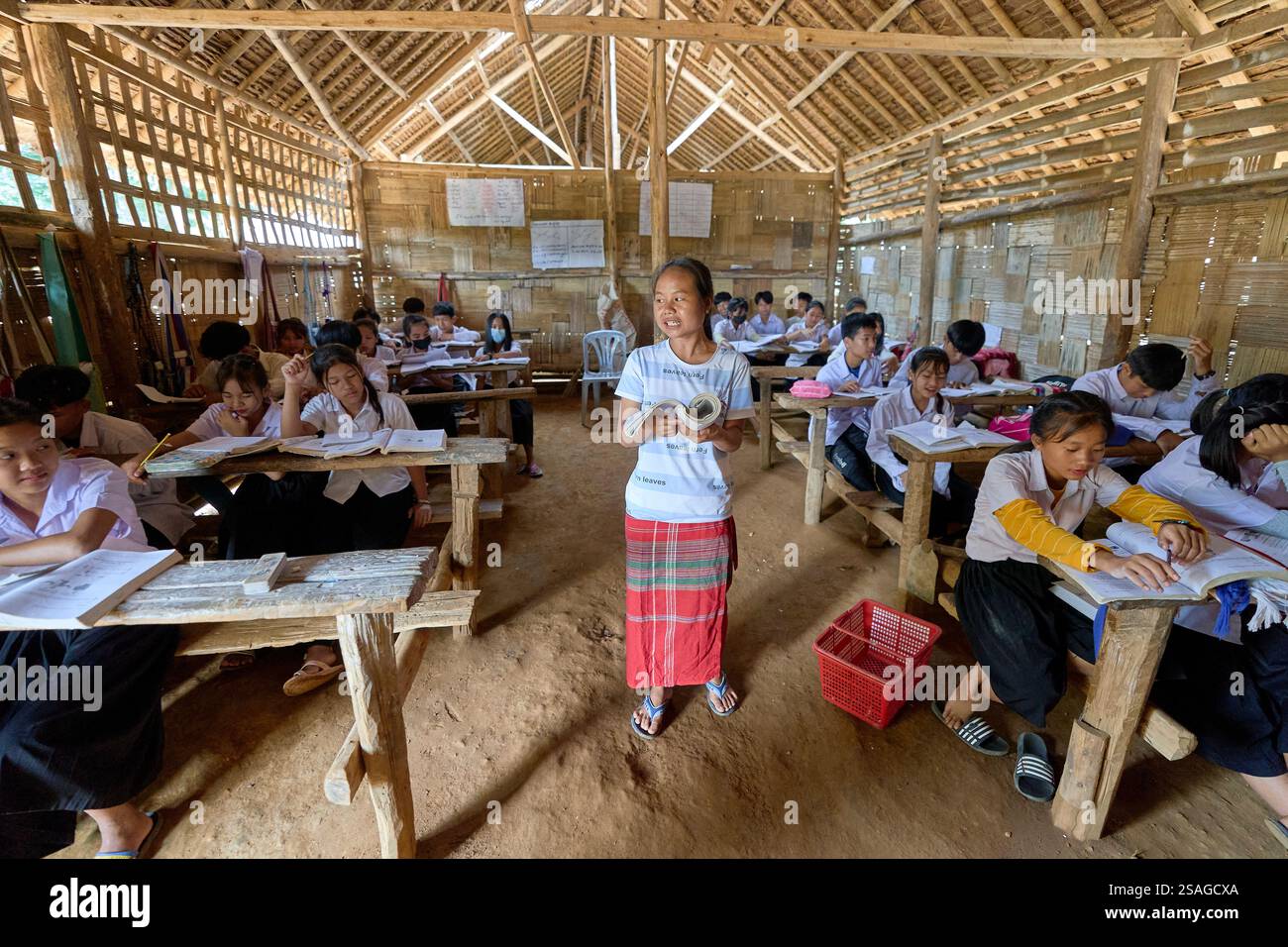 A teacher in a school in the Ban Mai Nai Soi refugee camp in Thailand ...