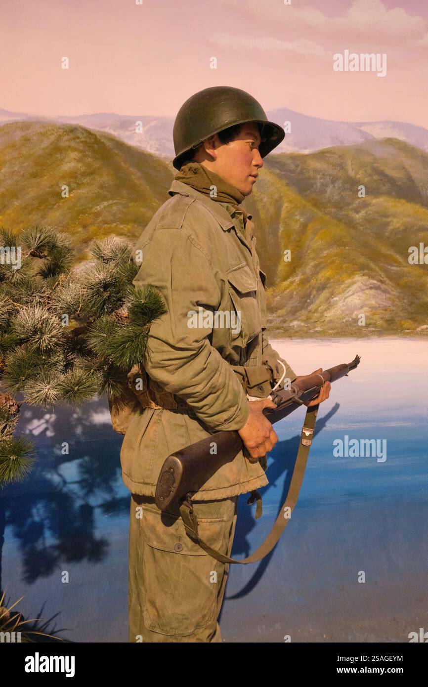 Diorama of a typical soldier, wearing a winter coat for cold protection ...