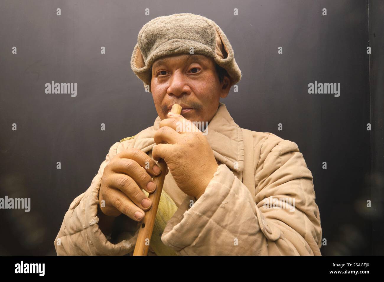 A diorama of a typical soldier with a recorder musical instrument. At ...
