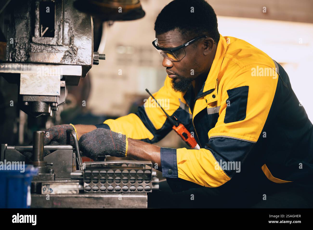 african black male worker working in heavy metal industry factory ...