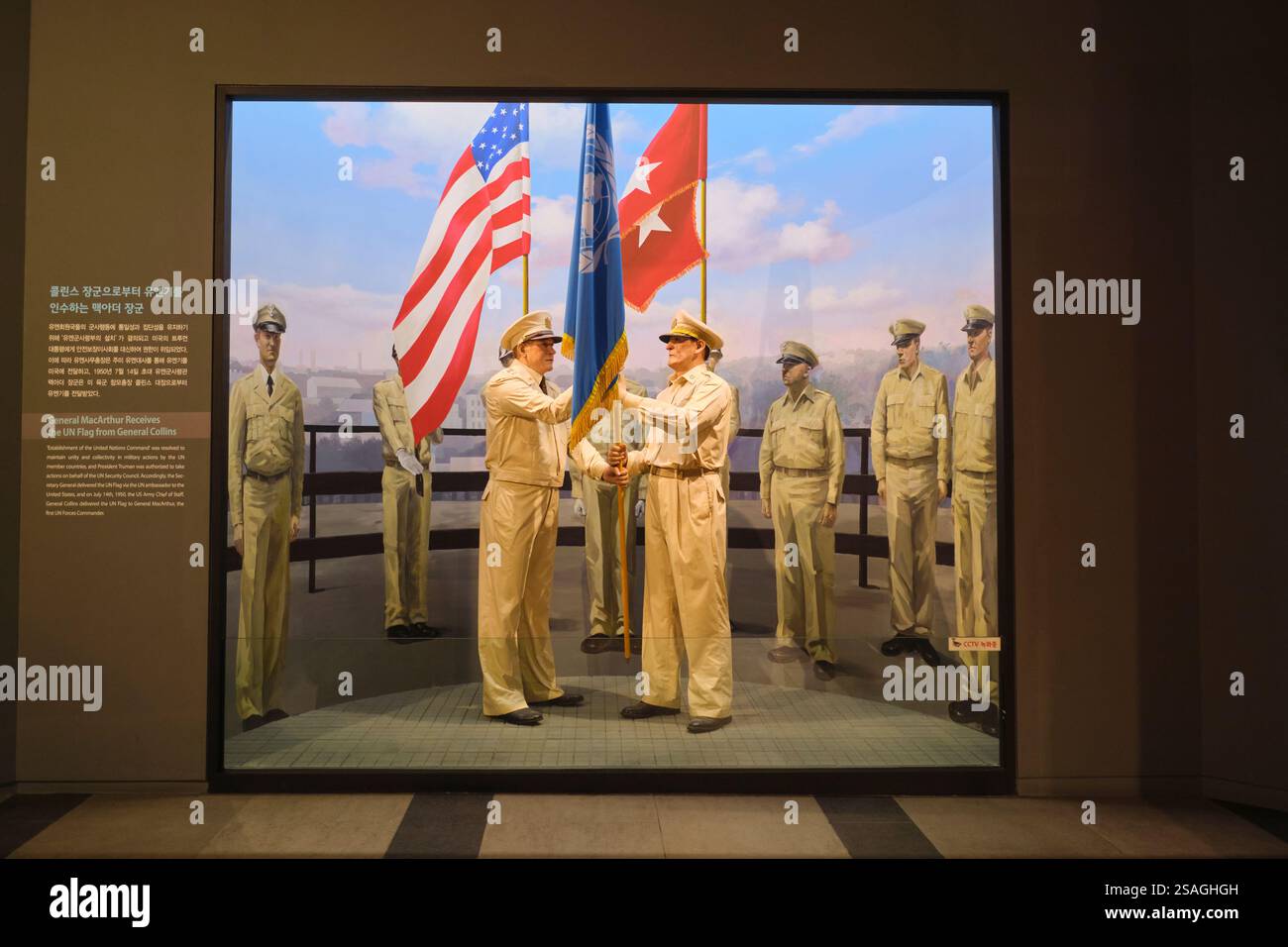 A diorama of General Collins presenting a United Nations flag to ...