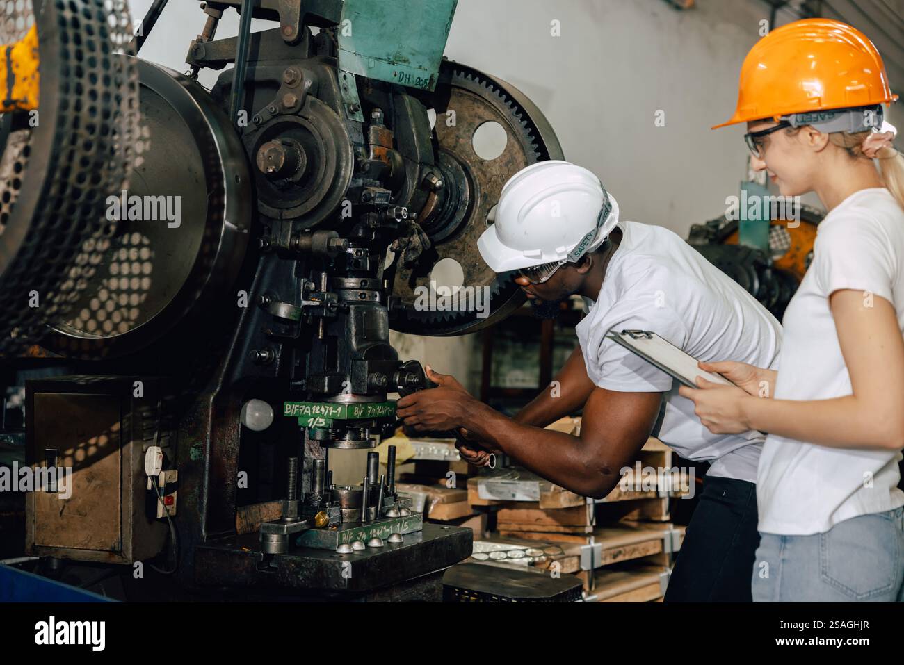 professional engineer team inspecting service maintenance old machine ...
