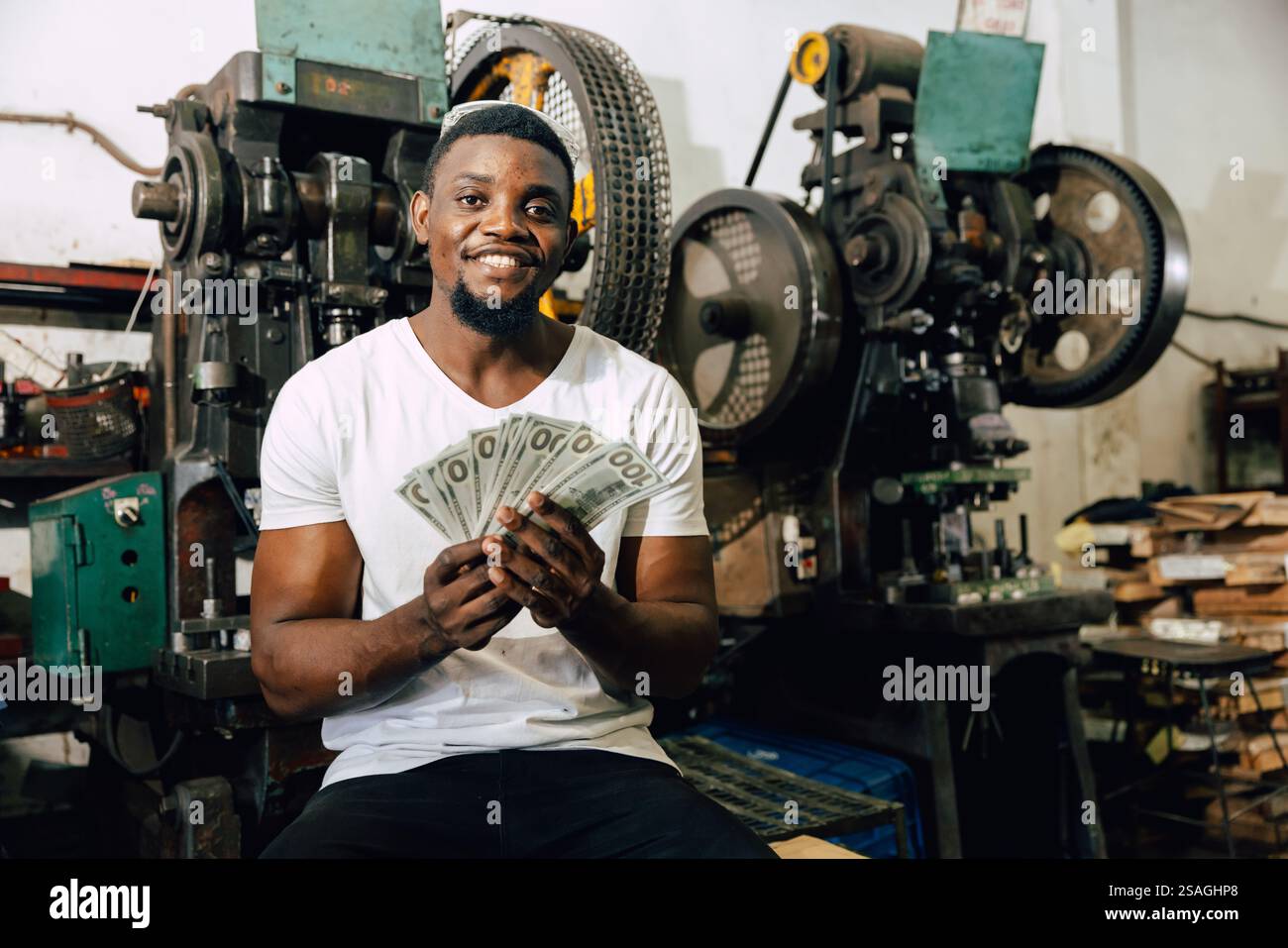 black labor worker get paid salary. man enjoy with payroll money income ...