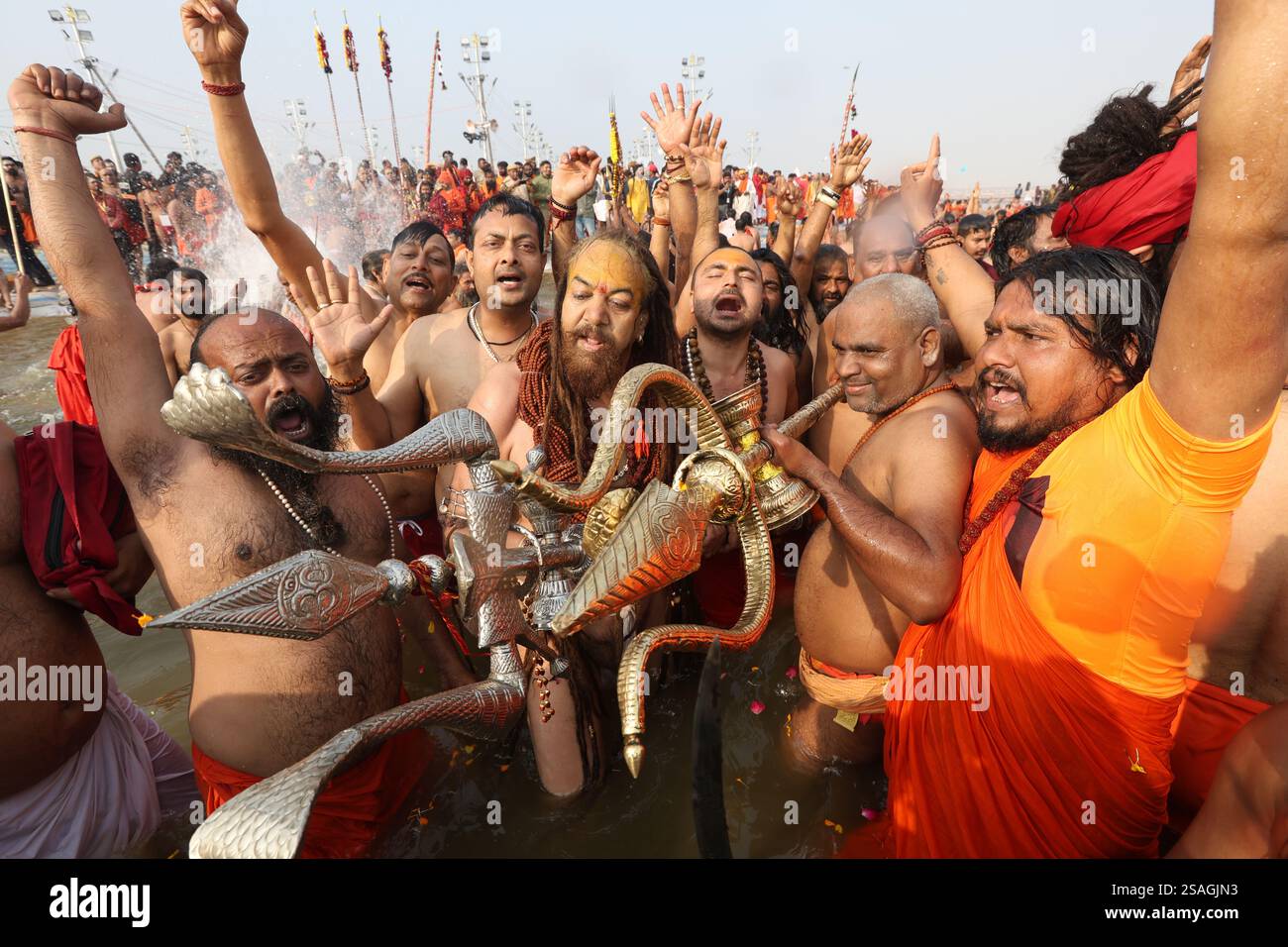 Holymen(Sadhus) take holy bath at the bank of Sangam on the occasion of ...