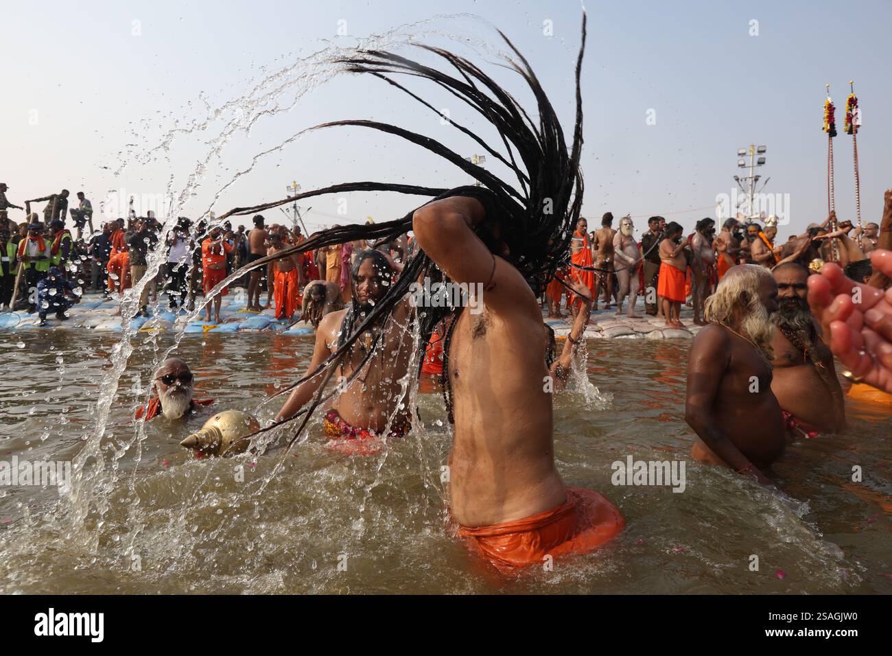 Holymen(Sadhus) take holy bath at the bank of Sangam on the occasion of ...