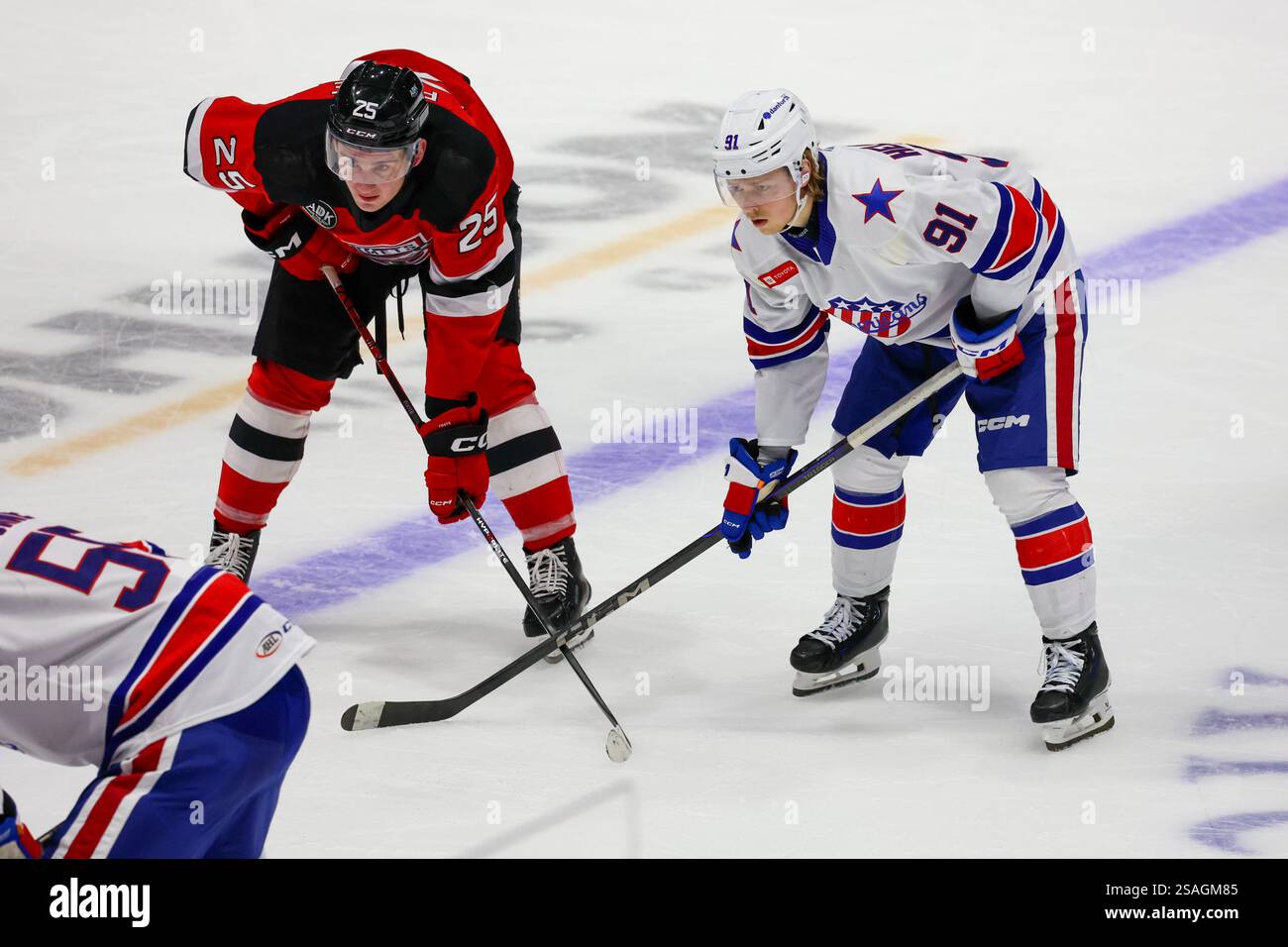 Rochester, New York, USA. 29th Jan, 2025. Rochester Americans forward Konsta Helenius (91) and ...