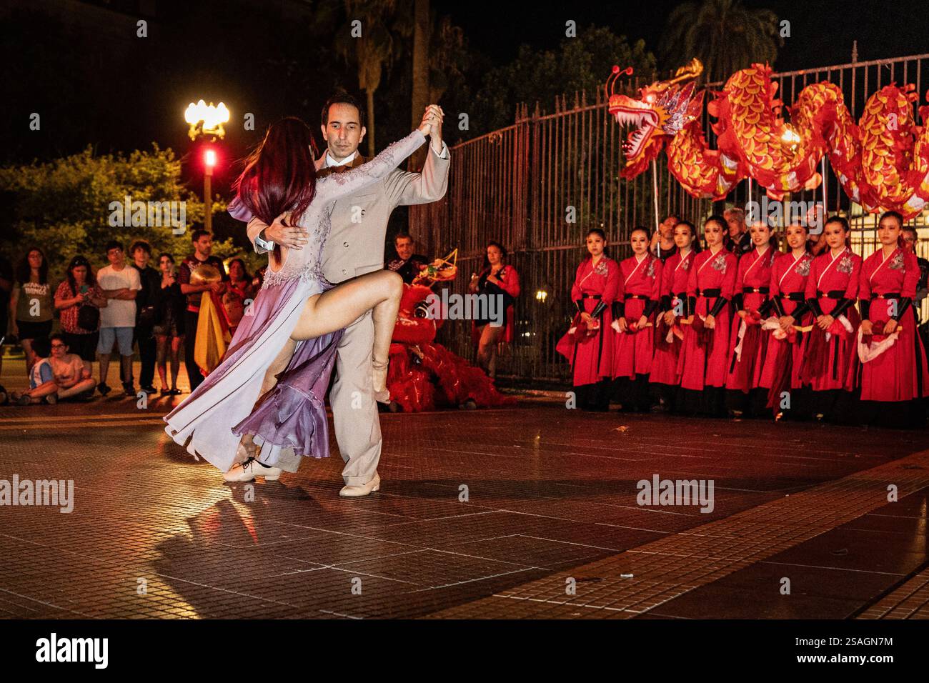 A Chinese-Argentine couple dances the tango. The Chinese community in ...