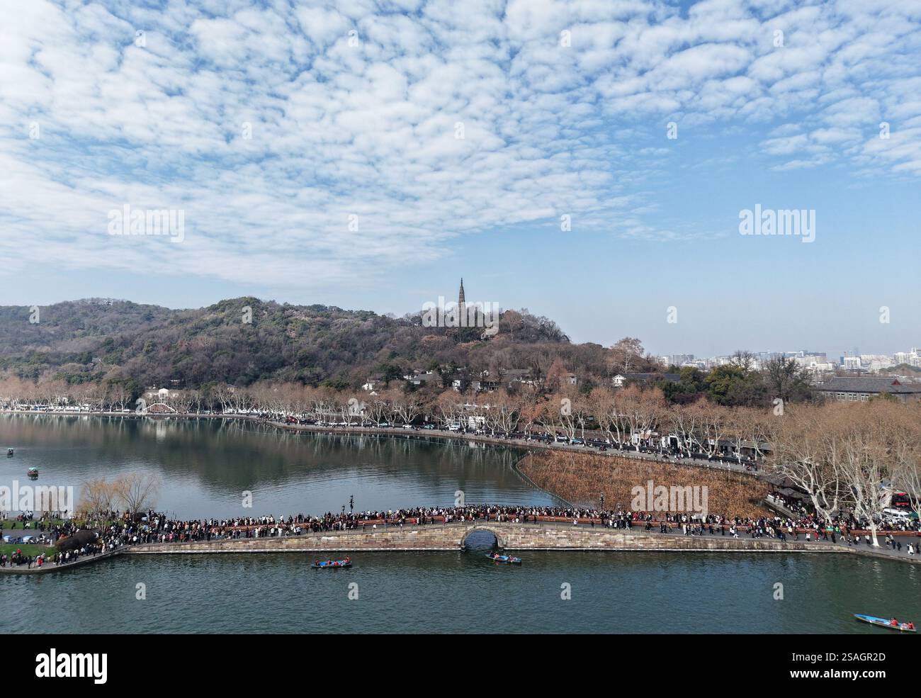 Tourists visit the West Lake scenic area during the Spring Festival ...