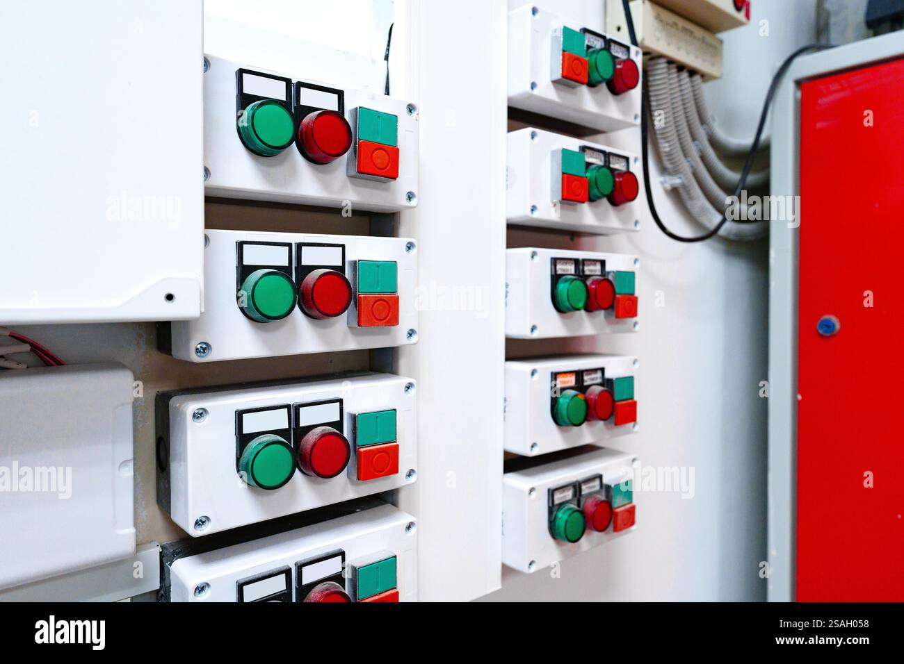 Control panel with multiple switches and indicators used for industrial ...