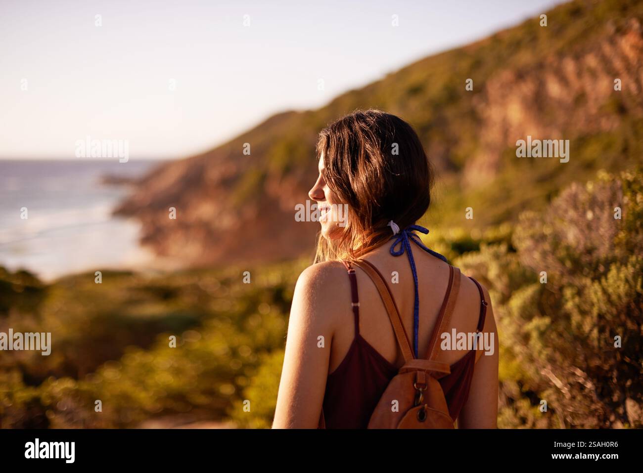 Smile, woman and hiking on mountain outdoor for adventure view, travel journey and destination ...