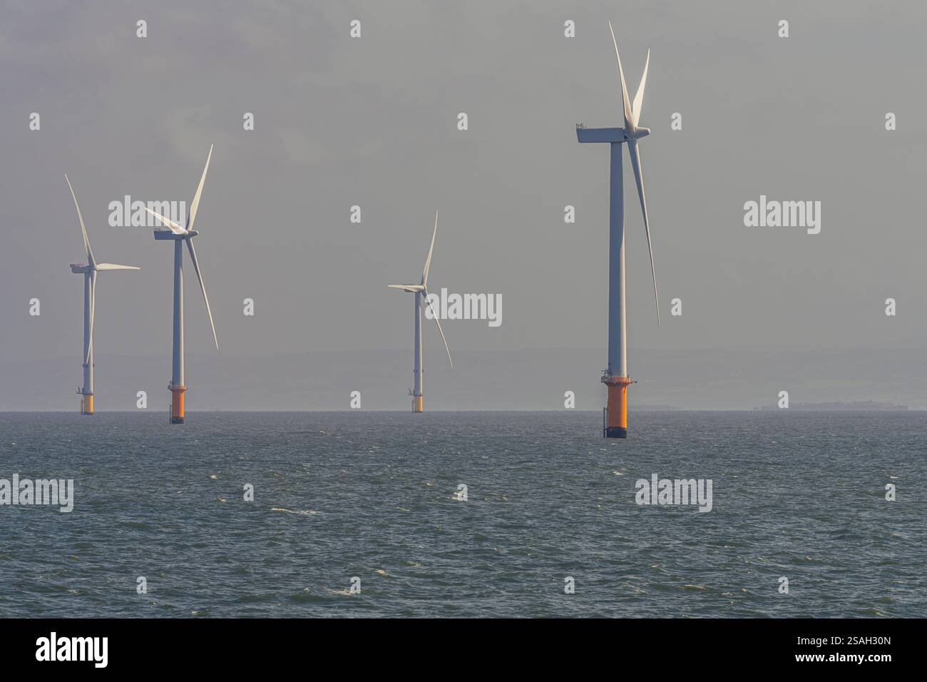 Wind turbines in the Irish Sea near Crosby, Merseyside, England, UK ...
