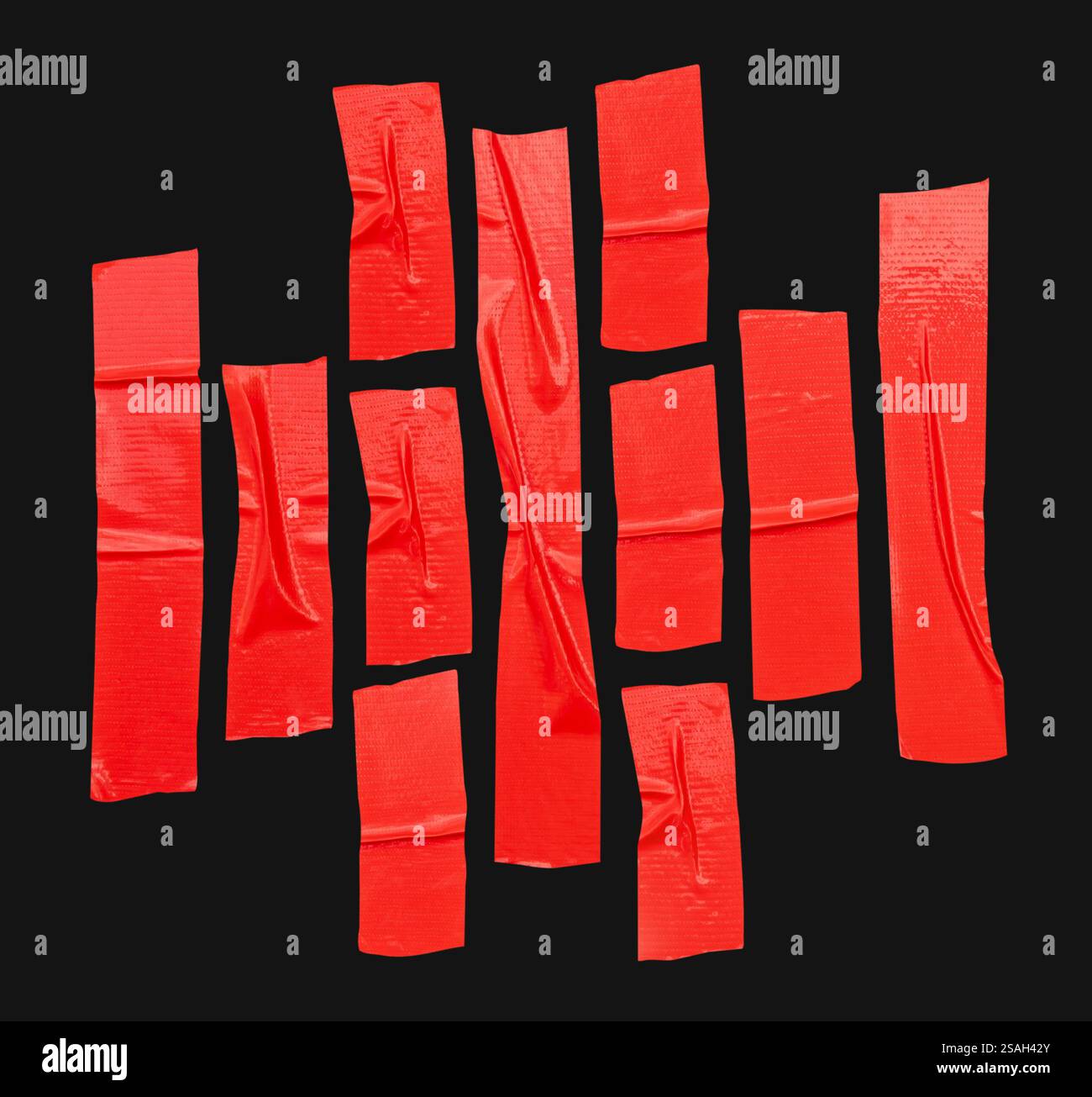 Top view set of red cloth tape or adhesive vinyl tape in stripes is ...