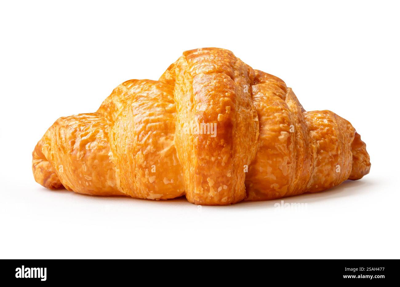 Side view of single brown or golden croissant is isolated on white ...