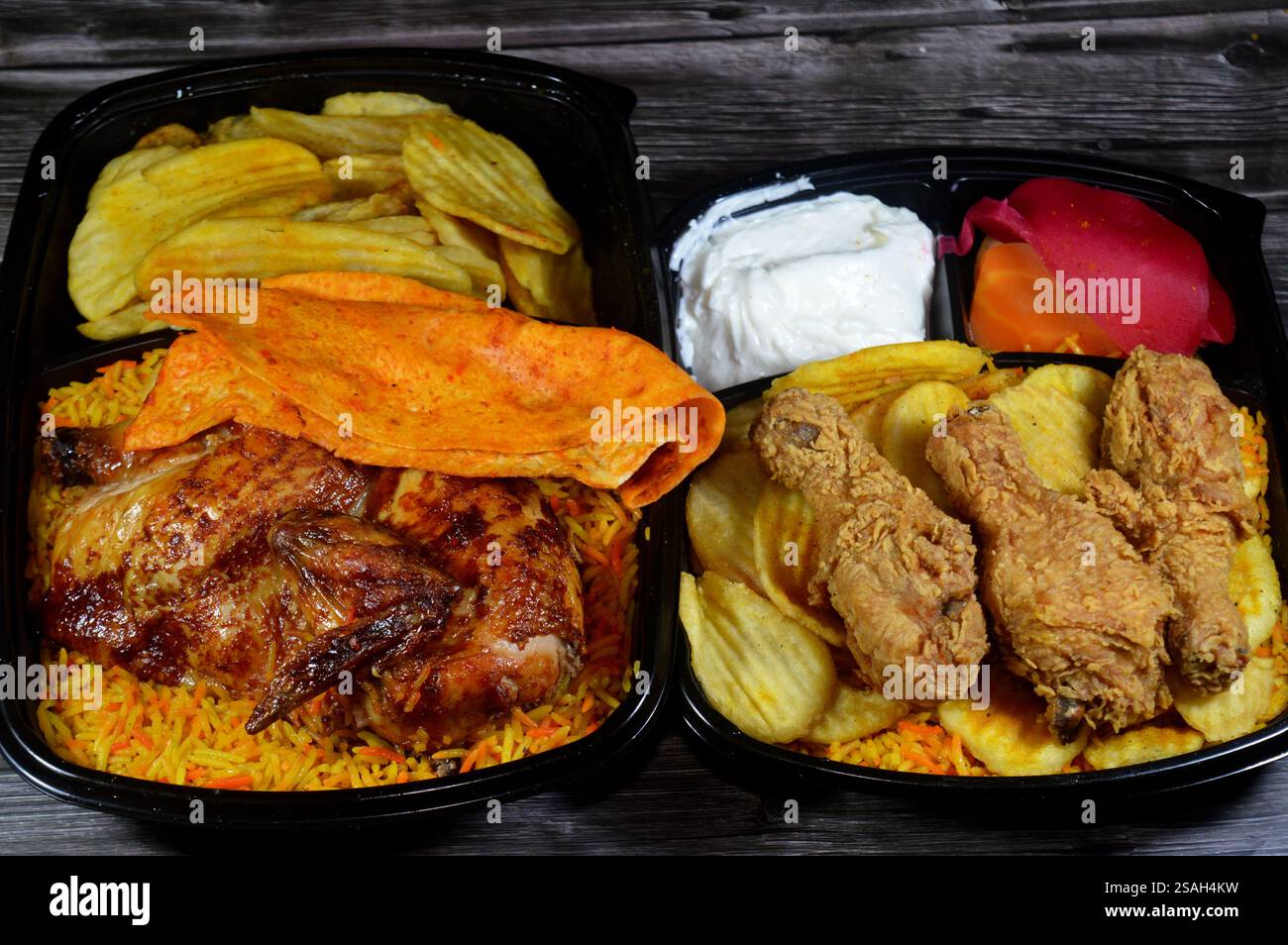 Syrian food of machine grilled barbecued chicken with colorful Basmati ...