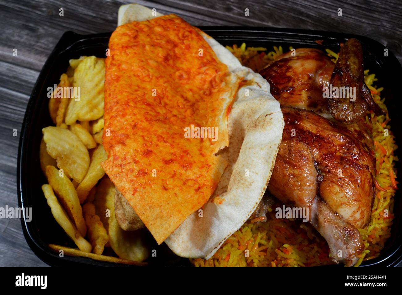 Arabic Syrian cuisine of machine grilled barbecued chicken with ...