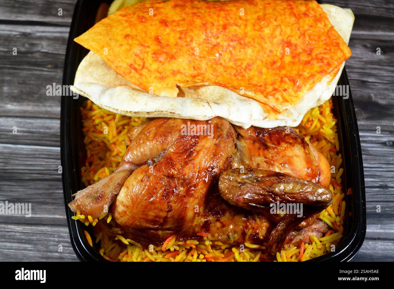 Arabic Syrian cuisine of machine grilled barbecued chicken with ...