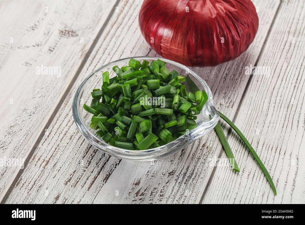 Diced fresh green onion in the bowl Stock Photo - Alamy