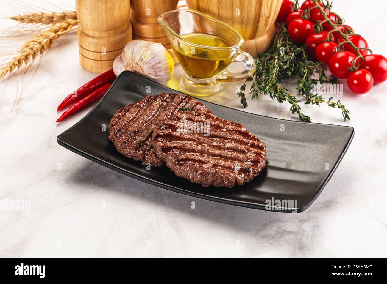 Grilled beef minced meat cutlet for burger Stock Photo - Alamy