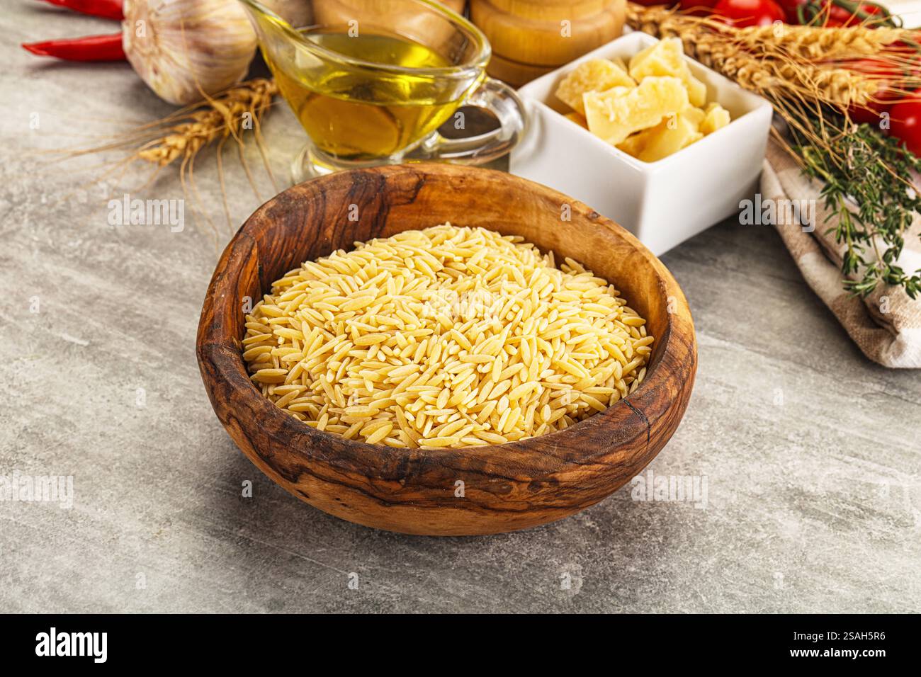 Italian raw dry pasta risoni for cooking Stock Photo - Alamy