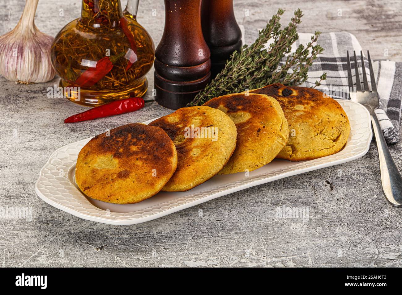 Georgian cuisine - yellow Corn bread Mchadi Stock Photo - Alamy