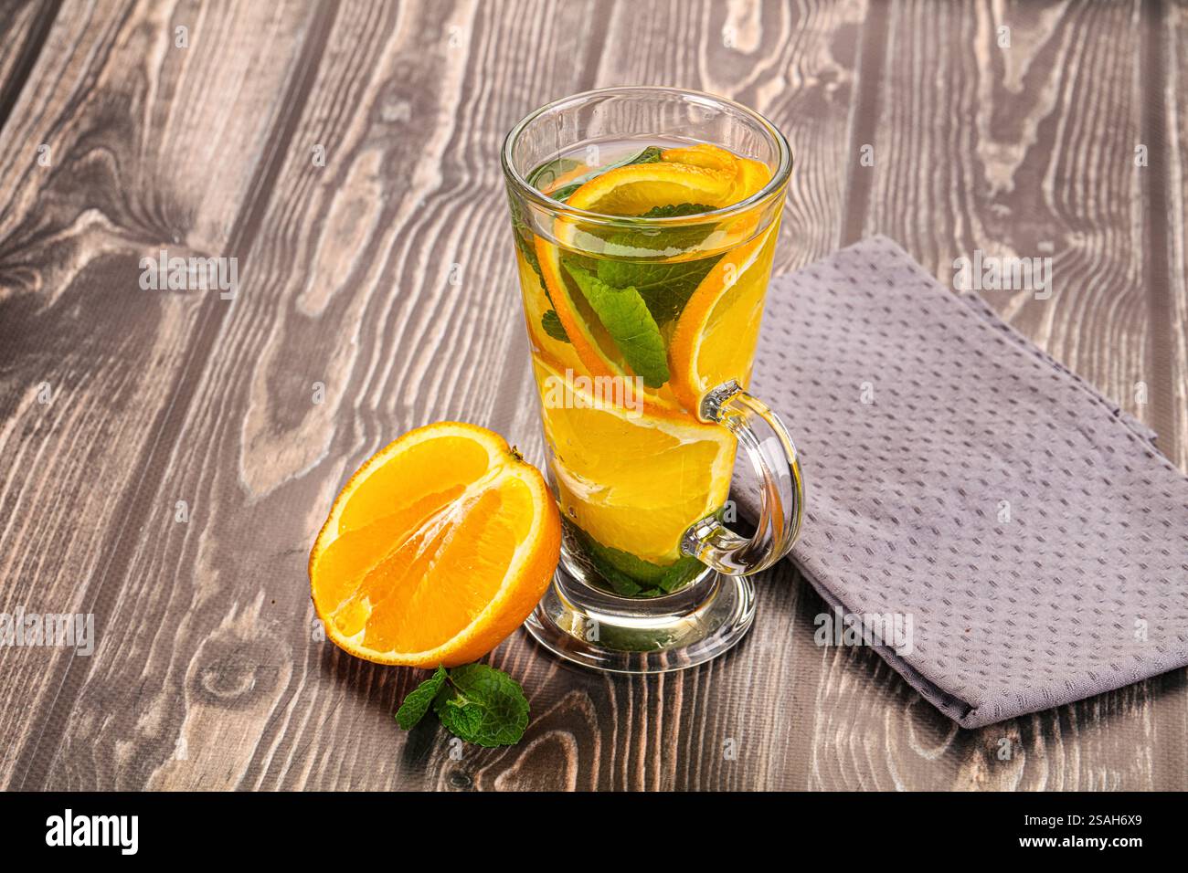 Fresh homemade orange lemonade with mint and fruit slices Stock Photo ...
