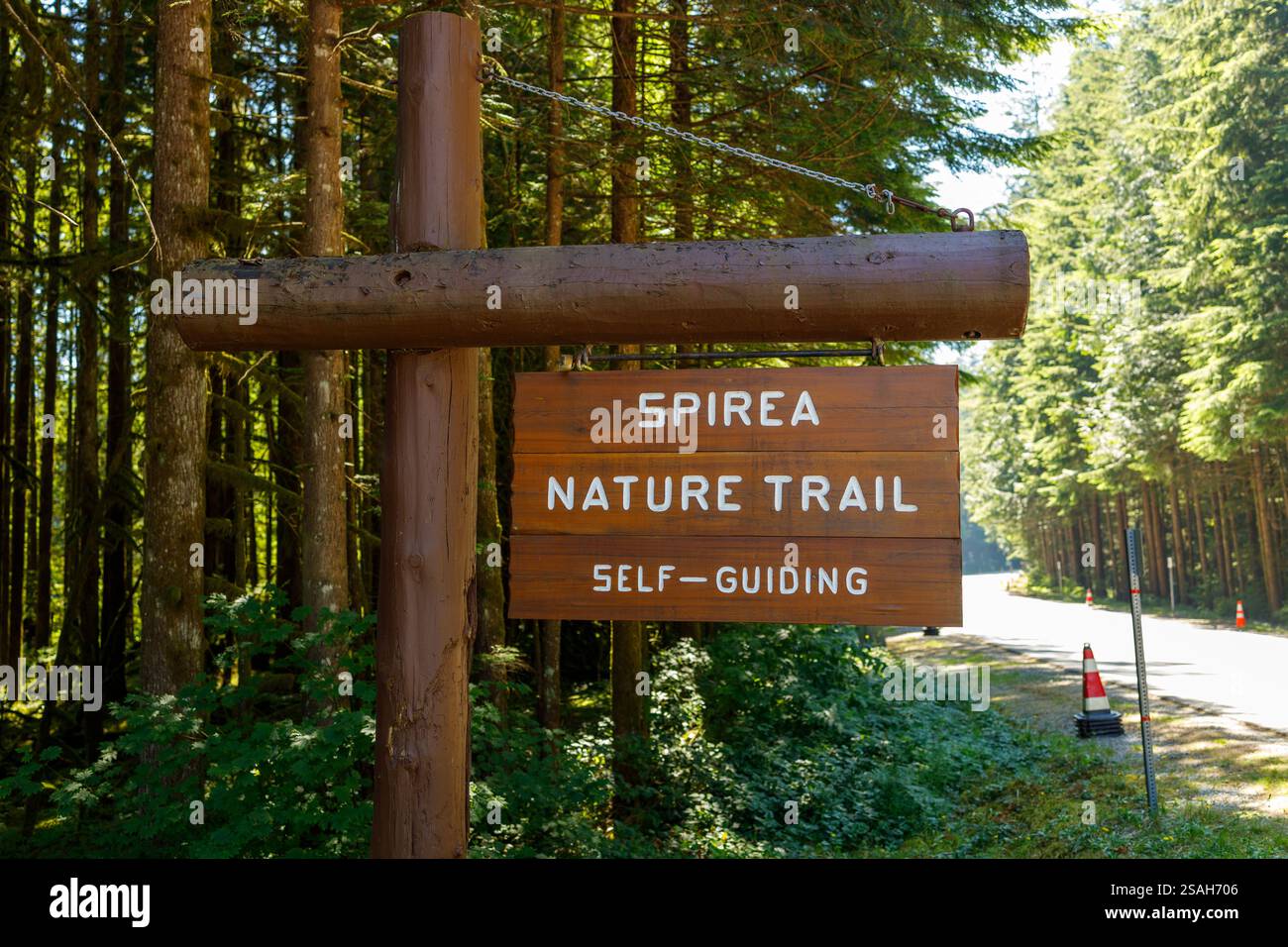 Wooden sign for Spirea Nature Trail indicating self-guided trail system ...