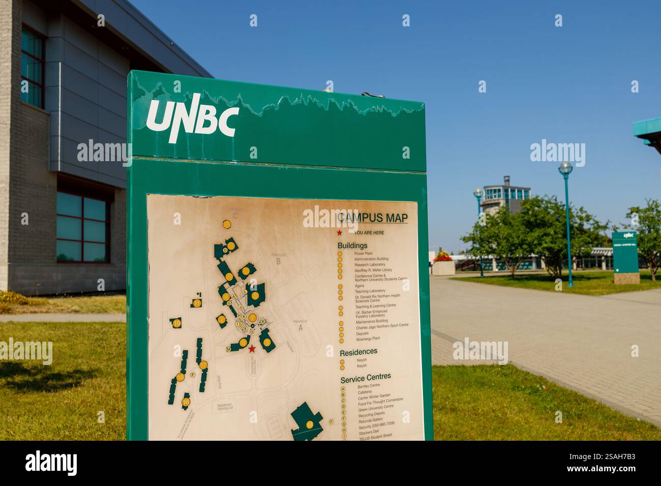 UNBC campus map display board showing building locations, residences ...