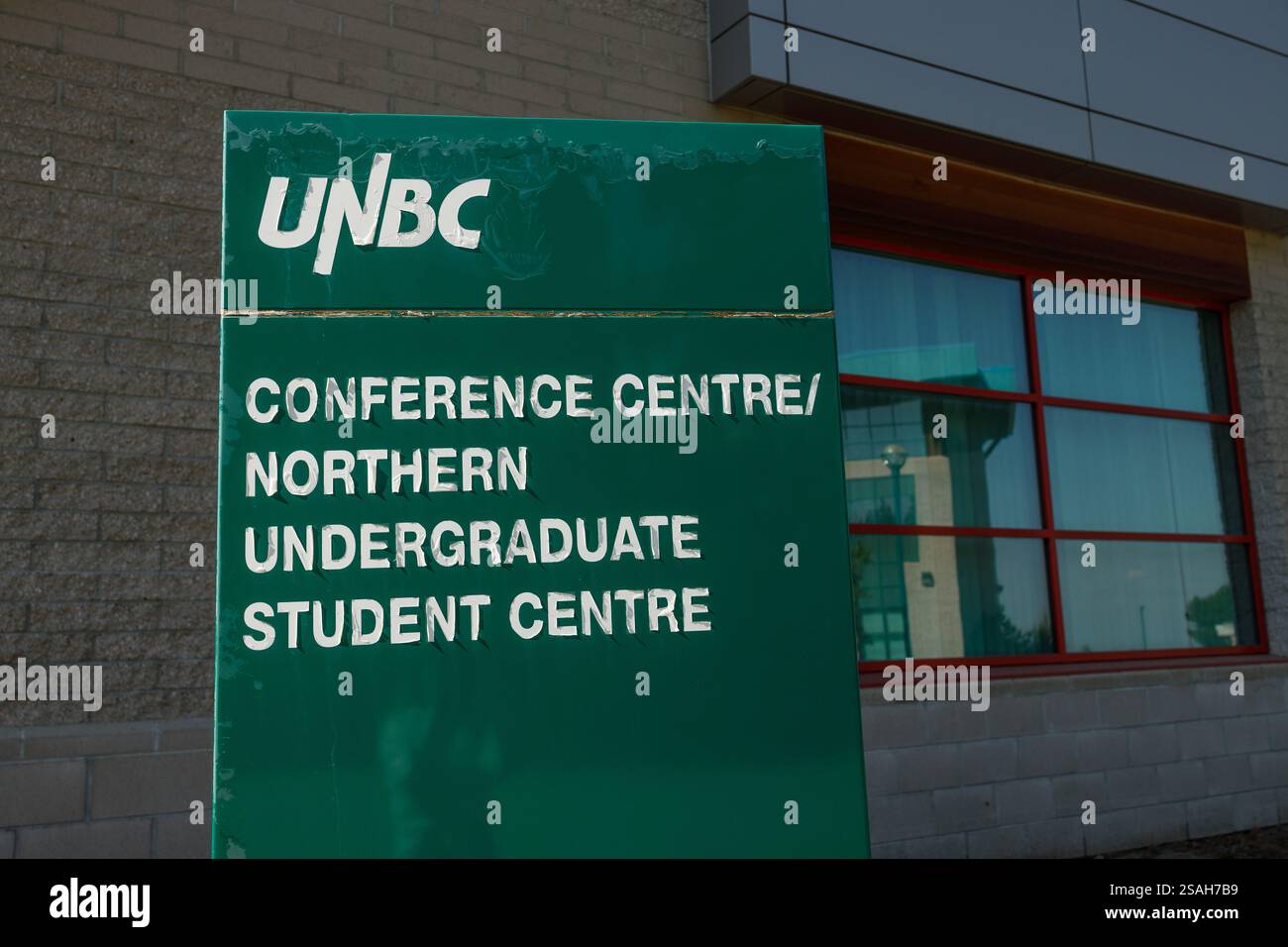 Green directional sign at UNBC showing "Conference Centre/Northern ...