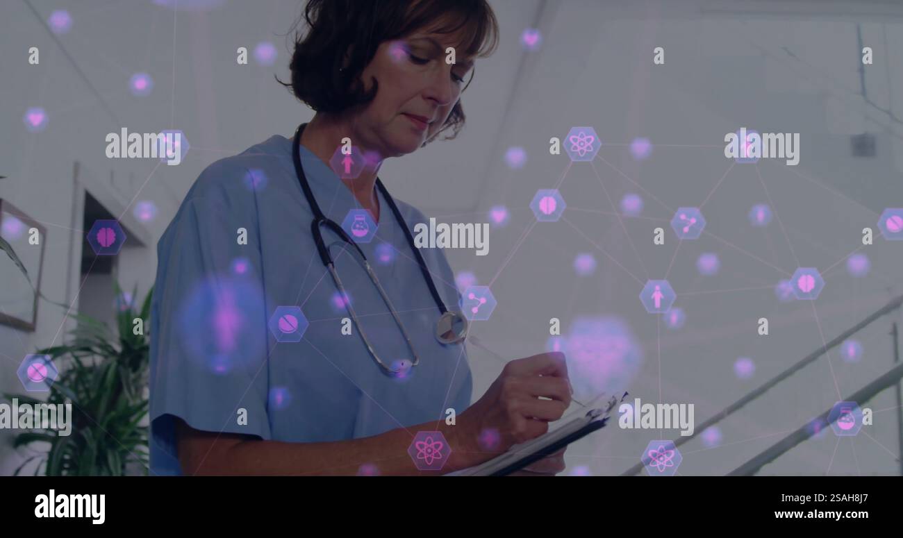 Image of network of connections with icons over caucasian female nurse ...