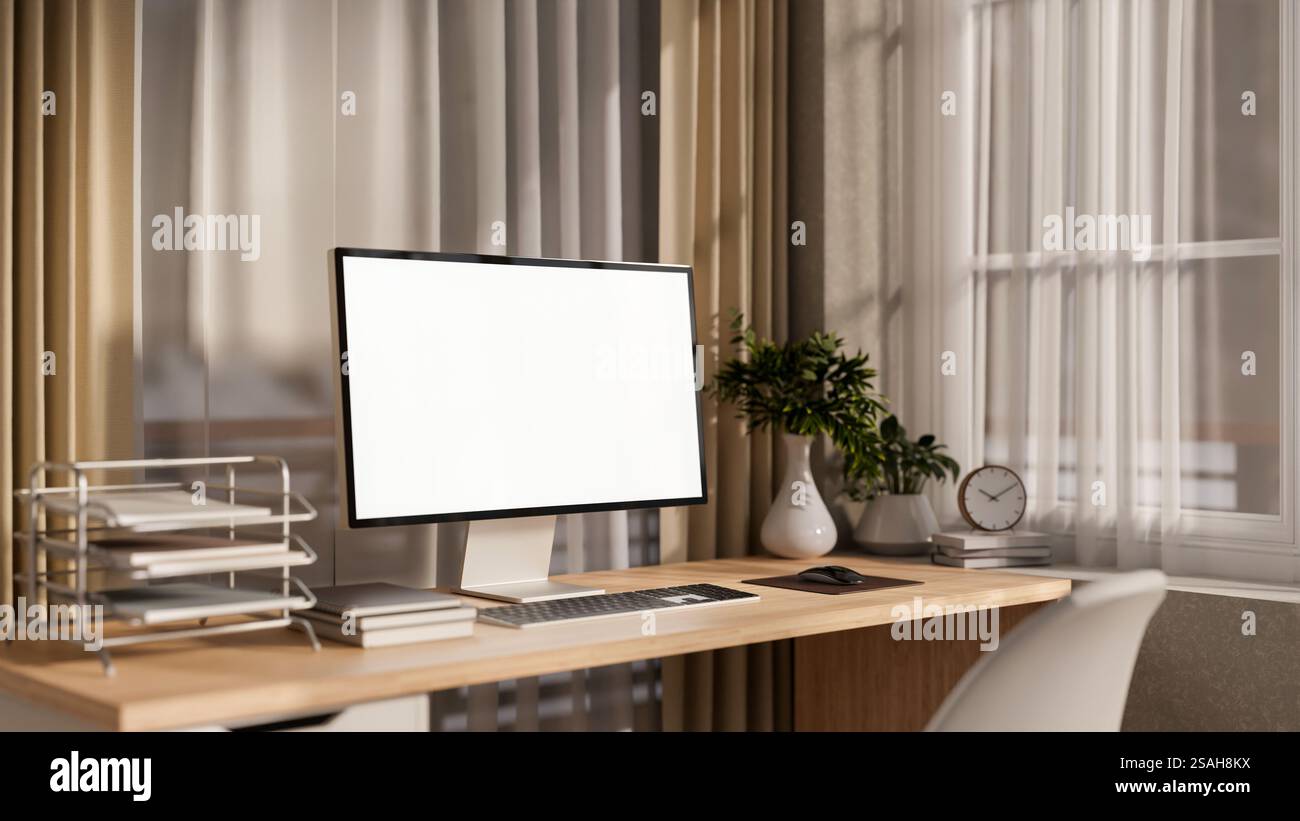 A computer with a white screen mockup and decorative items on a wooden ...
