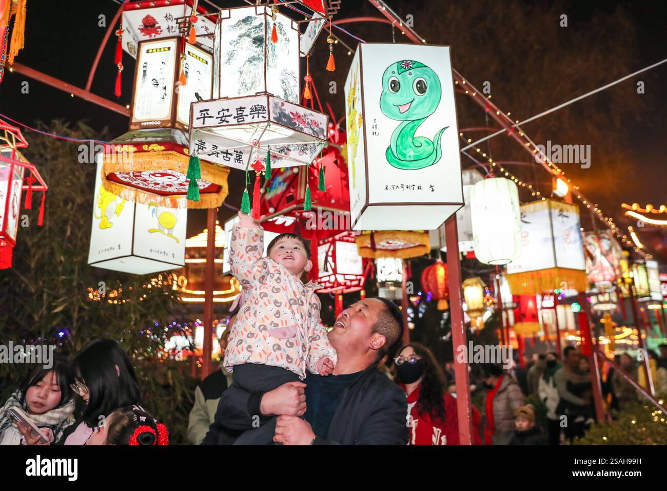 Beijing, China's Gansu Province. 22nd Jan, 2025. Tourists enjoy a ...