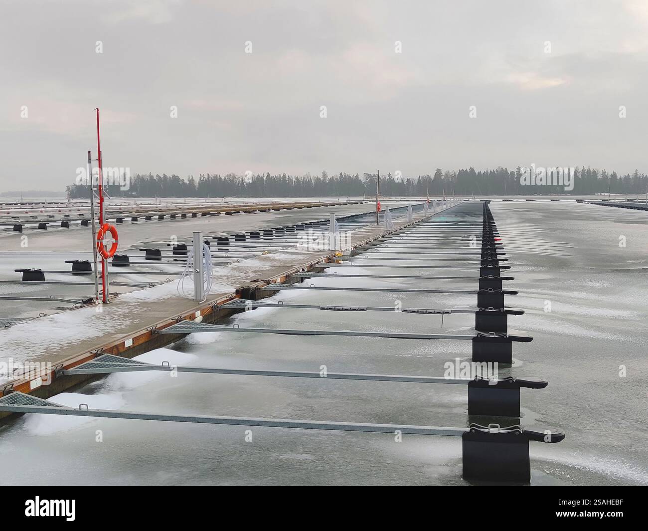 Sea marina at winter, iced Baltic sea, empty frozen harbor , winter ...