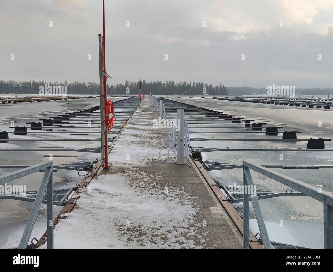 Sea marina at winter, iced Baltic sea, empty frozen harbor , winter ...