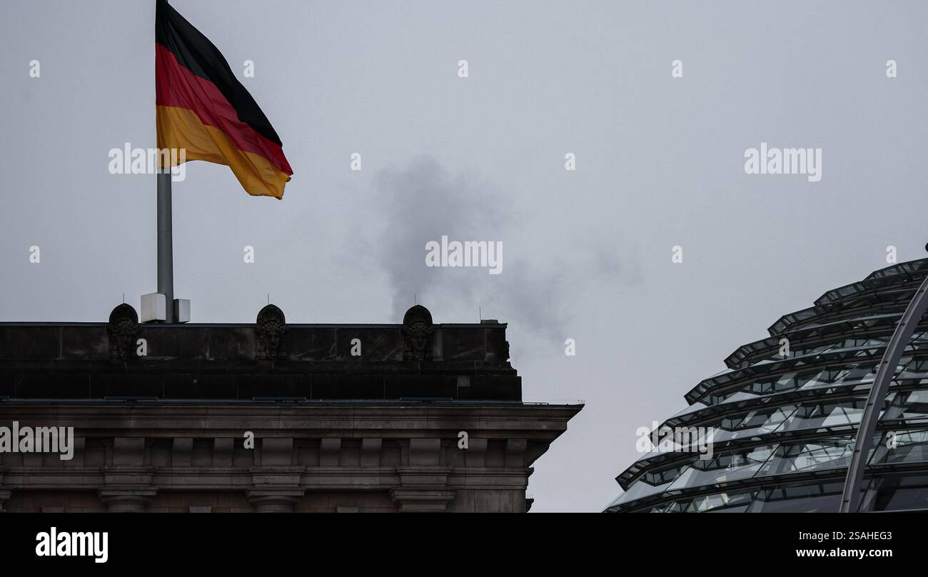 Berlin, Germany. 30th Jan, 2025. Steam rises above the Reichstag ...