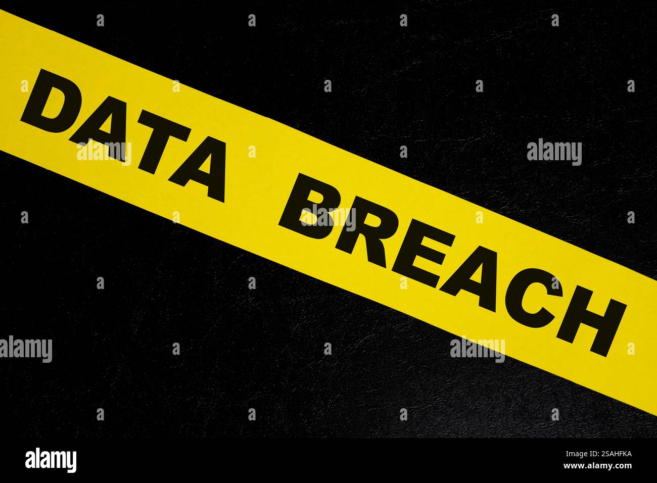 Data breach alert, caution and warning concept. Yellow barricade tape ...