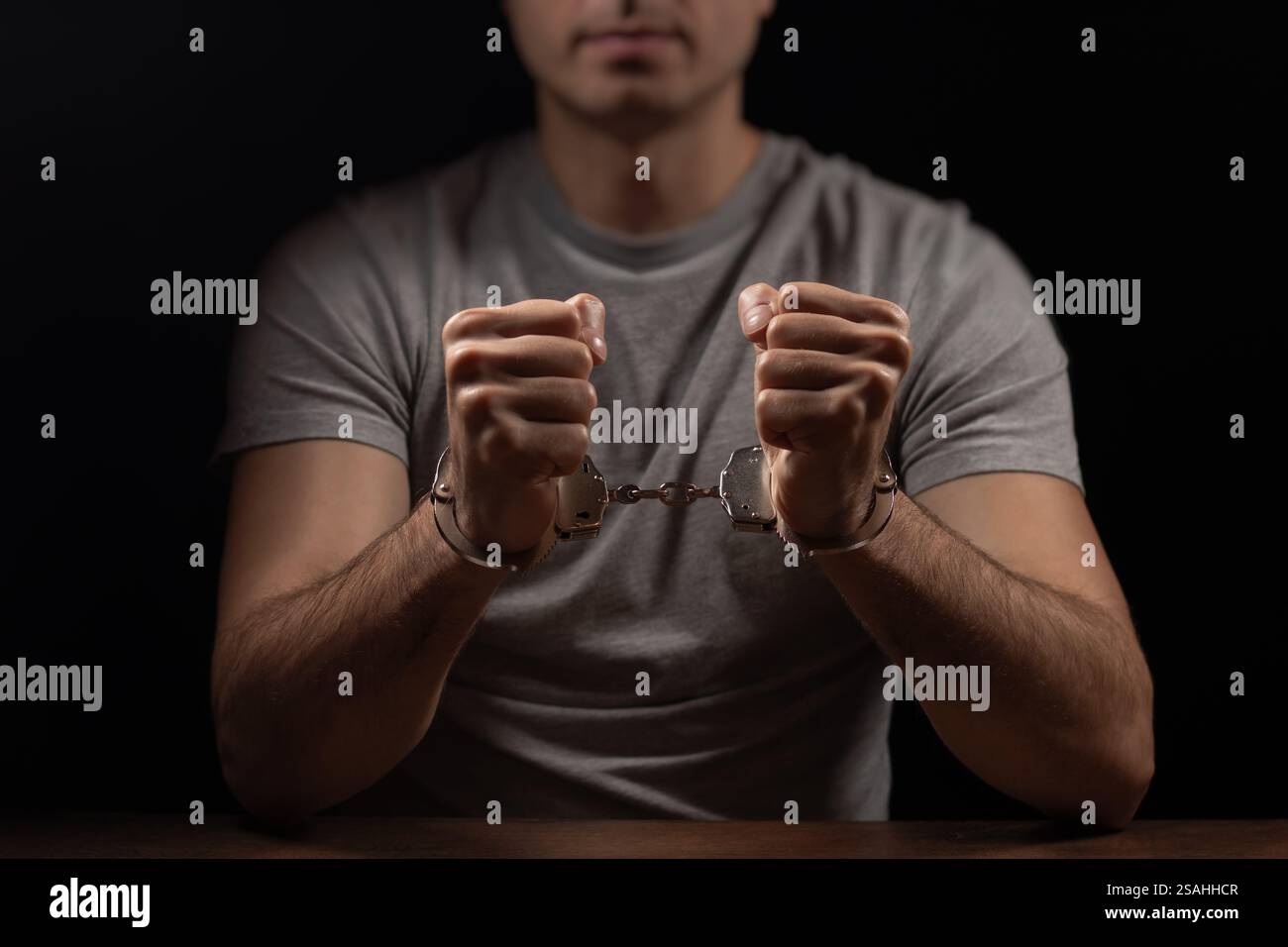 Man, criminal and handcuffs for interrogation, crime or money ...