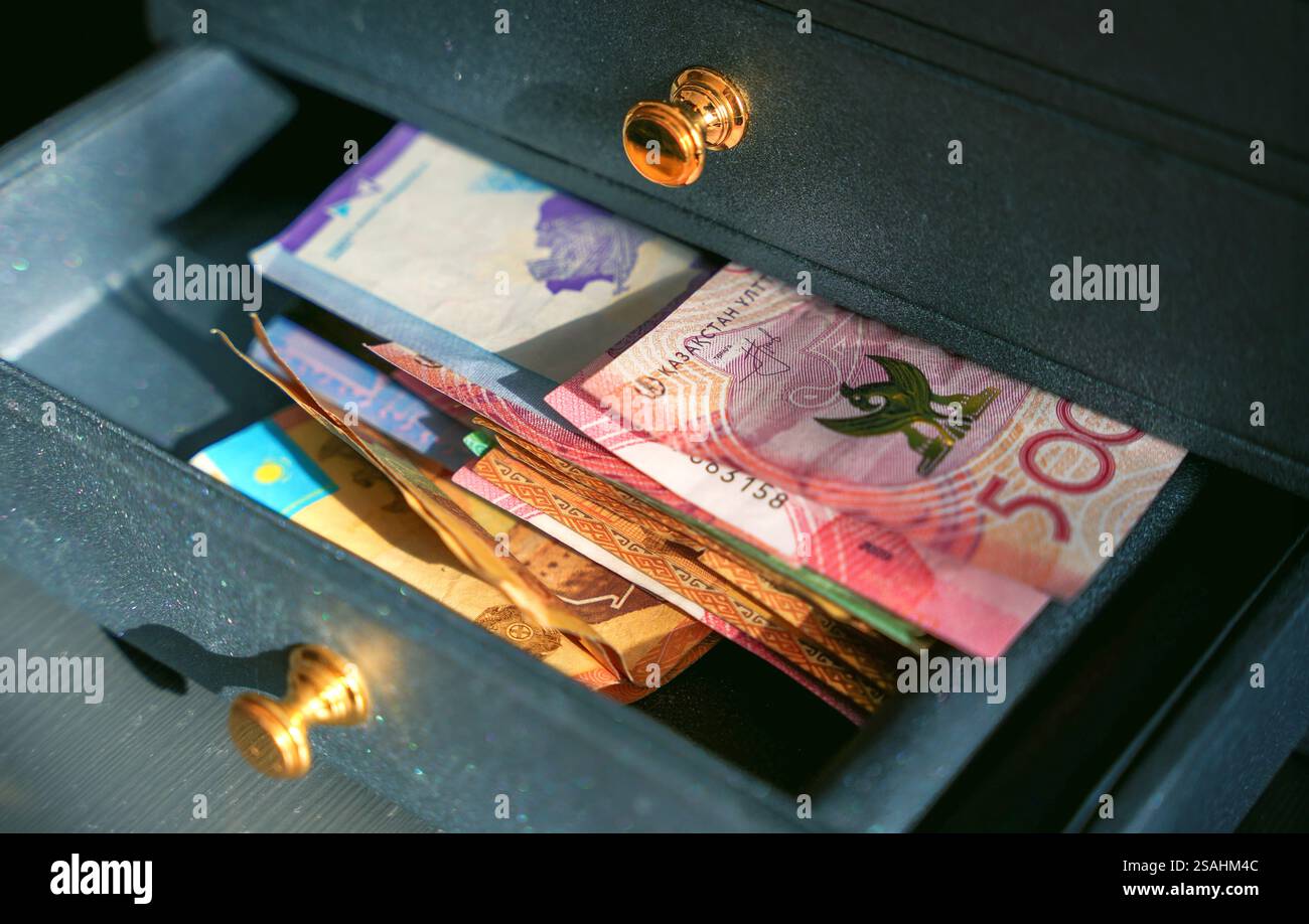Tenge banknotes are in the box. Currency transactions Stock Photo - Alamy